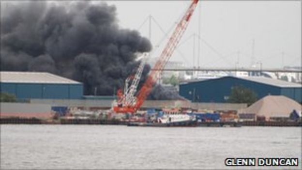 DLR suspended by Canning Town recycling plant fire - BBC News