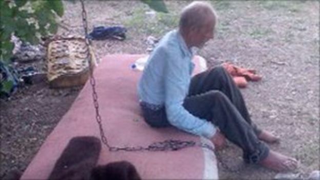 Elderly father chained up like dog in southern Russia - BBC News
