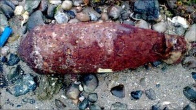 World War II bomb is washed up on beach at Bellerena - BBC News