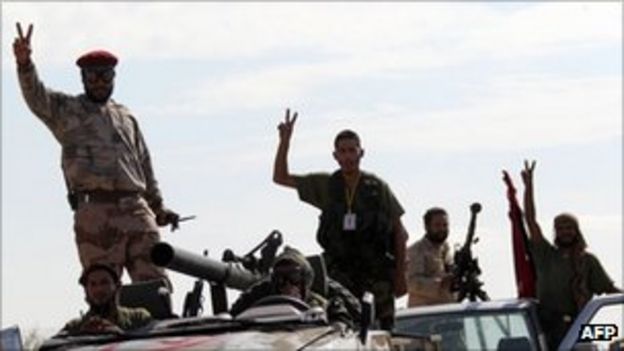 Libya conflict: Muammar Gaddafi urges mass protests - BBC News