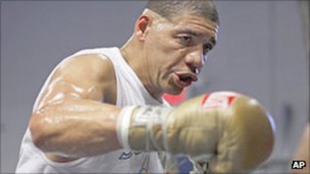 Man wrongly convicted of murder makes boxing debut - BBC News