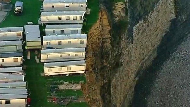 Caravans left on cliff edge as coast crumbles in Wales - BBC Newsround