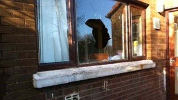 Pipe bomb is thrown through window of house in Poleglass - BBC News