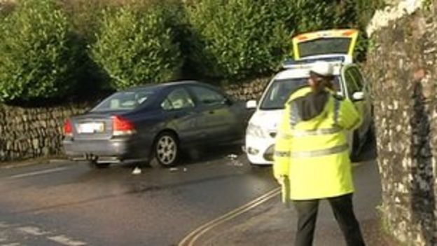 Woman crushed against police car in Tavistock - BBC News