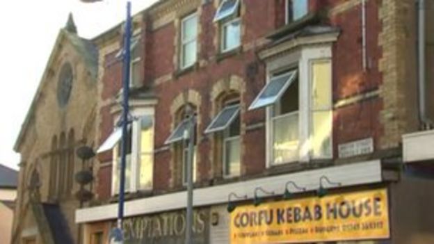 Thirteen taken to hospital after Rhyl flats fire rescue - BBC News