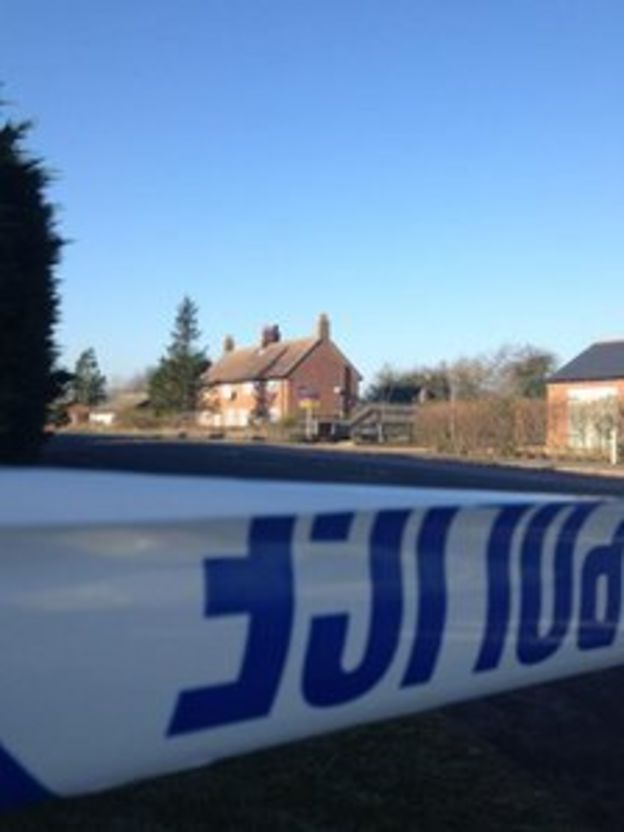 Sutton St James siege officer was shot in face - BBC News