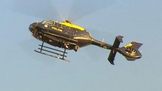 Youths 'shone laser' at police helicopter - BBC News