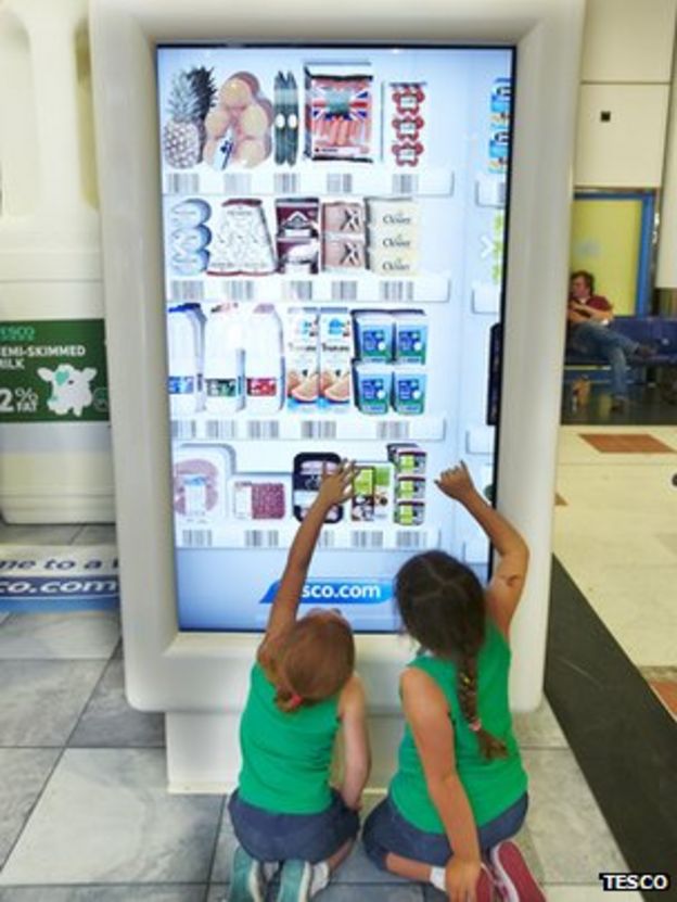 Tesco try out virtual grocery shopping at Gatwick Airport - BBC News