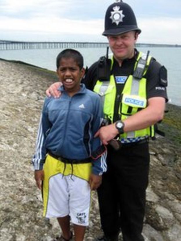 Policeman strips off to rescue boy from Southend sea - BBC News