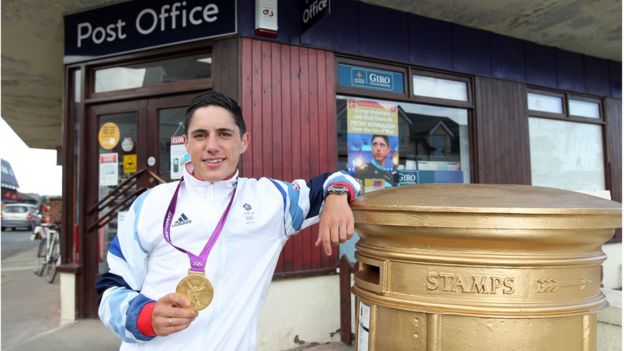 U-turn over repainting of Olympian's gold post box after outcry - BBC News