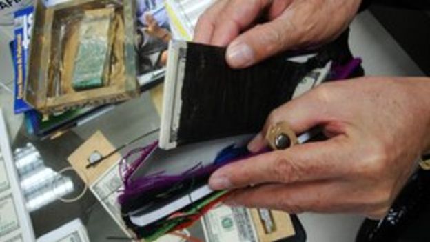 Why fake dollars are big business in Peru - BBC News