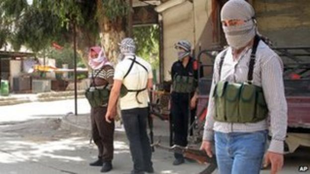 Damascus Alawites stand firm behind Assad - BBC News