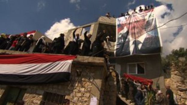 Grim determination in Assad Alawite heartland - BBC News