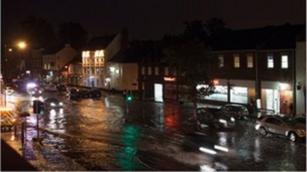 Hundreds of homes flooded as downpours continue - BBC News