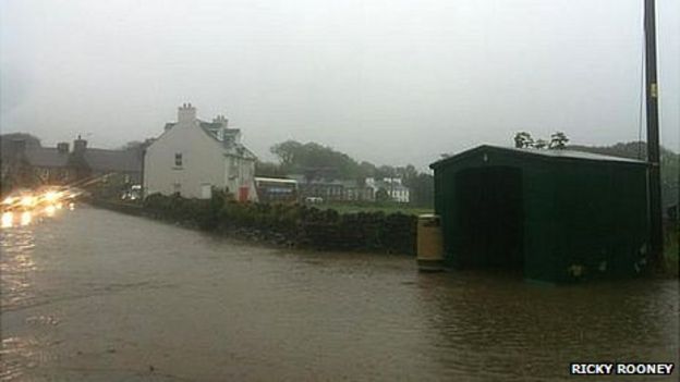 Rain causes 'localised flooding' across Isle of Man - BBC News