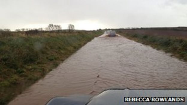 Rail line closed for second time as floods hit Cumbria - BBC News