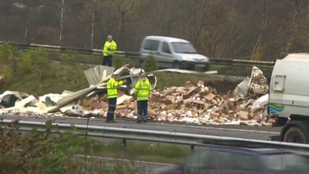 M4 reopens after lorry overturns at junction 47 near Swansea - BBC News
