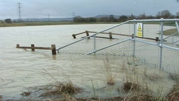 Restoration works of flood embankment completed in Gloucester - BBC News