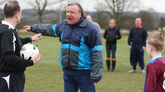 The football dads kicking off on the sidelines - BBC News