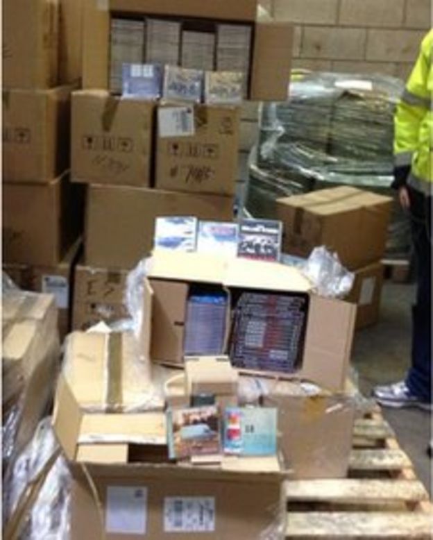 'Largest' haul of counterfeit CDs seized at Manchester Airport - BBC News