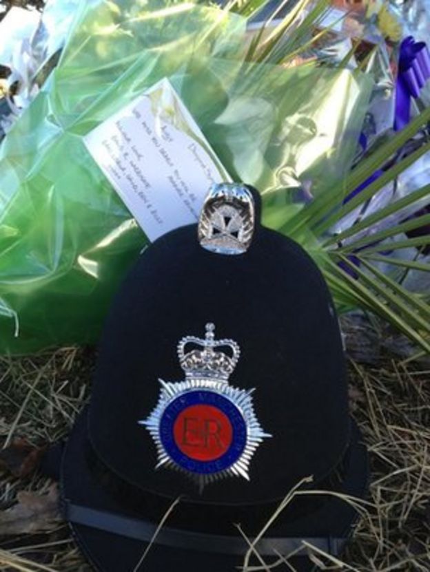 Rochdale officers pay respects to PC Andrew Bramma - BBC News