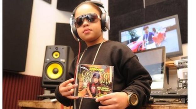 Music producer defends nine-year-old rapper Lil Poopy - BBC News