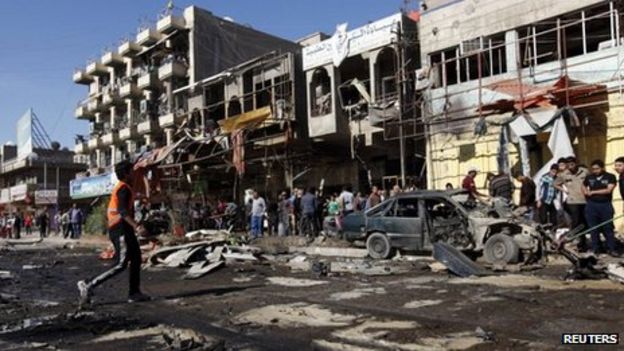 Baghdad hit by deadly blasts on invasion anniversary - BBC News