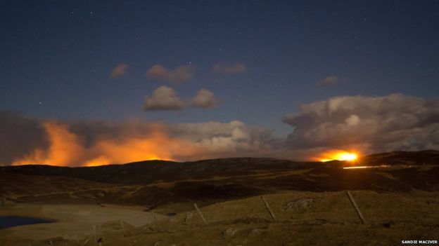 In pictures: Wild fires light up the night - BBC News