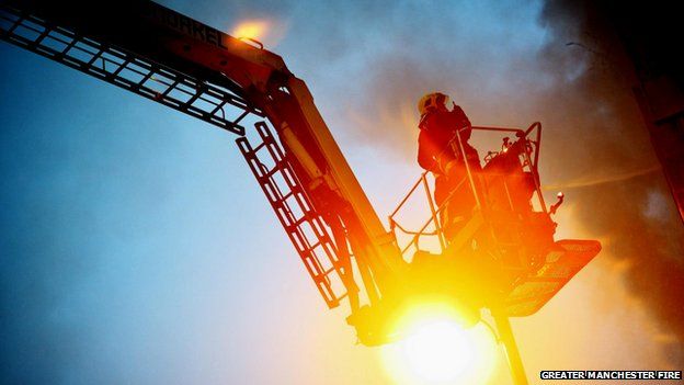 'Demolition' needed at Manchester building fire scene - BBC News