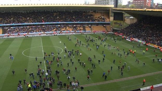 Wolves FC pitch invasion prompts police probe - BBC News