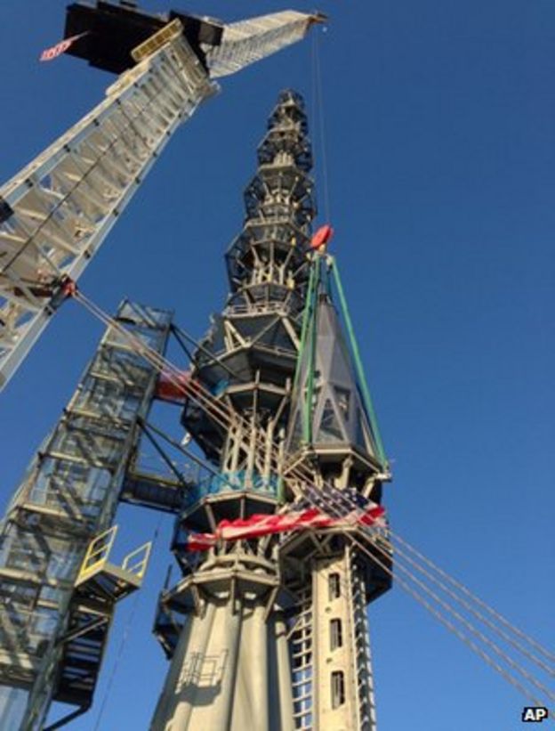 One World Trade Center spire installed in New York City - BBC News