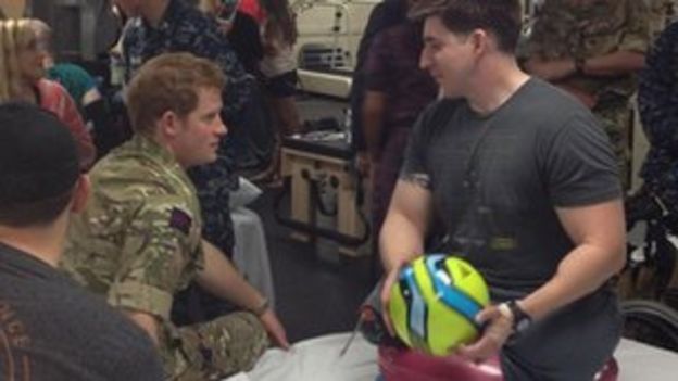 Prince Harry continues US tour with visit to war cemetery - BBC News