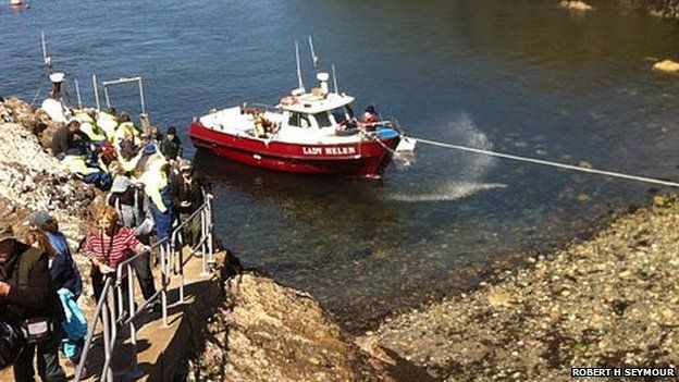 48 passengers rescued after boat hits rocks in Wales - BBC Newsround