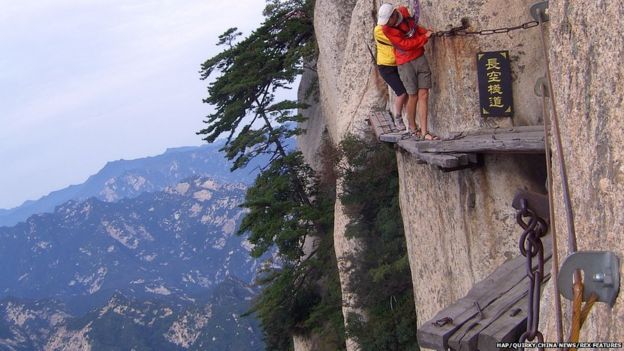 World's scariest walkway? Tourists brave Chang Kong Cliff Road in China ...