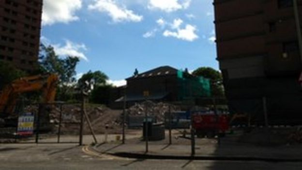 Dundee church in middle of tower block demolition - BBC News