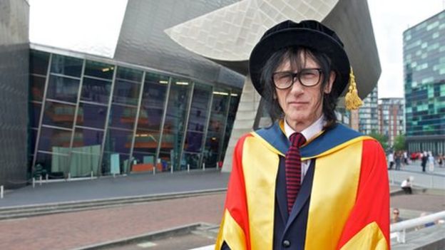 John Cooper Clarke: Punk poet given Freedom Of Salford - BBC News