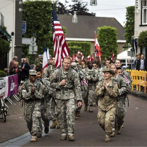 West London teenagers march 100 miles through Netherlands - BBC News