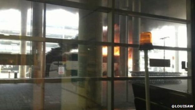 Coach catches fire at Gatwick Airport - BBC News