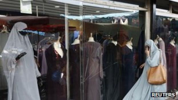Swedish women don headscarves after assault on Muslim - BBC News