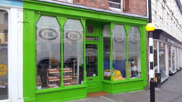 Pocklington's Bakery told to repaint lime green shop-front - BBC News