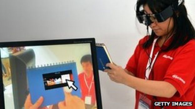 Google Glass update lets users wink and take photos - BBC News