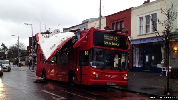 Bus hits railway bridge in Kingston after wrong turn - BBC News
