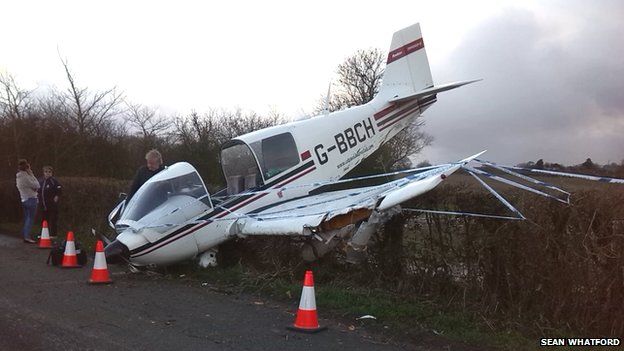 Gloucestershire light aircraft crash leaves pilot unhurt - BBC News