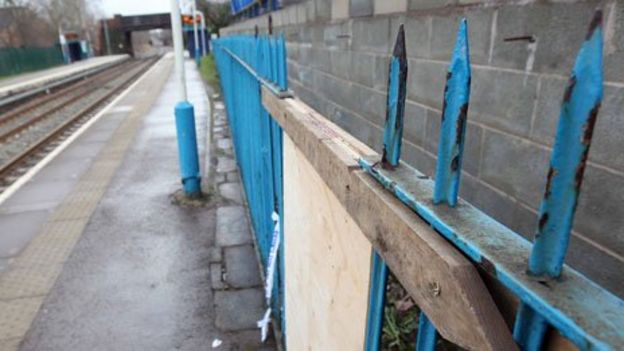 Man impaled on station railings cut free by fire crews - BBC News