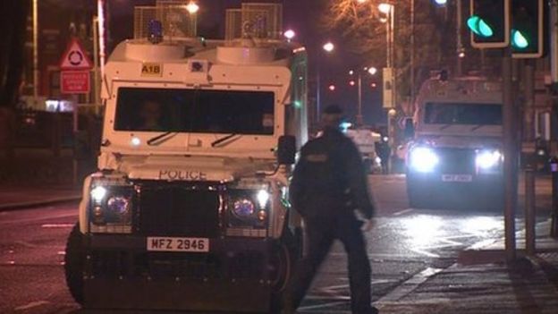 Belfast police targeted in Falls Road bomb attack - BBC News