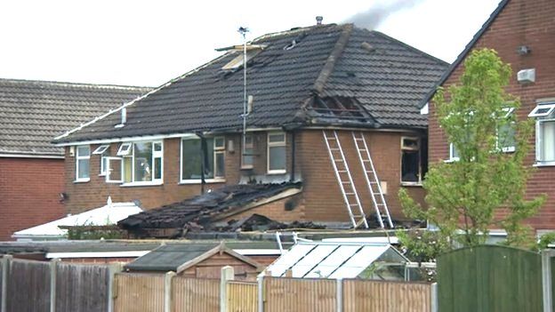 Garforth house fire stab woman 'unlawfully killed' - BBC News