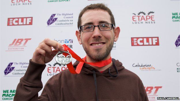 Thousands of cyclists compete in Etape Loch Ness - BBC News