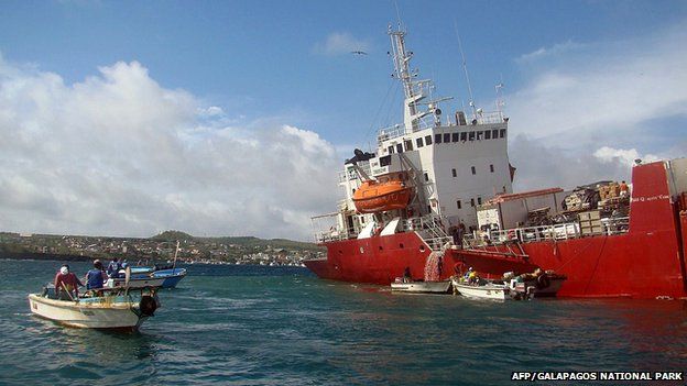 Container ship stuck on rocks near Ecuador - BBC Newsround