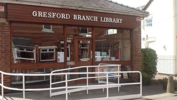 Residents re-open library in Gresford, Wrexham - BBC News