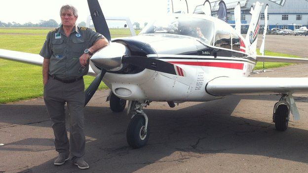 Pilot back in Scotland after 59,000 mile global journey - BBC News